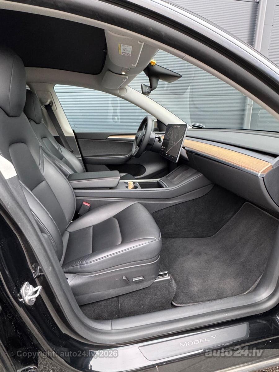 Black Tesla Model Y 2021 in Tallinn, with an engine capacity of 0.00 L and mileage of 98 thousand km for 28900 €, photo 13 on AUTOMOTO.COM.LV