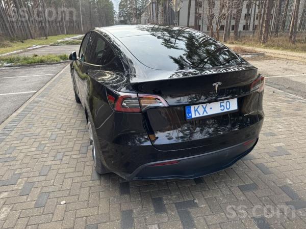 Черный Тесла Модель Y 2021 в Рига, объемом двигателя 0.00 л и пробегом 129 тыс. км за 30900 €, фото 6 на AUTOMOTO.COM.LV