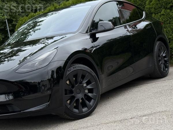 Black Tesla Model Y 2021 in Jurmala, with an engine capacity of 0.00 L and mileage of 0 thousand km for 29950 €, photo 3 on AUTOMOTO.COM.LV