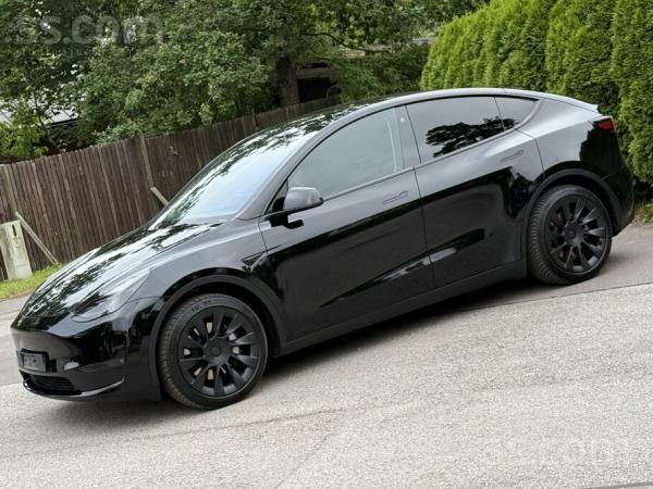 Black Tesla Model Y 2021 in Jurmala, with an engine capacity of 0.00 L and mileage of 0 thousand km for 29950 €, photo 6 on AUTOMOTO.COM.LV