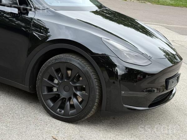 Black Tesla Model Y 2021 in Jurmala, with an engine capacity of 0.00 L and mileage of 0 thousand km for 29950 €, photo 9 on AUTOMOTO.COM.LV