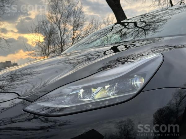 Black Tesla Model Y 2022 in Jelgava, with an engine capacity of 0.00 L and mileage of 63 thousand km for 31490 €, photo 8 on AUTOMOTO.COM.LV