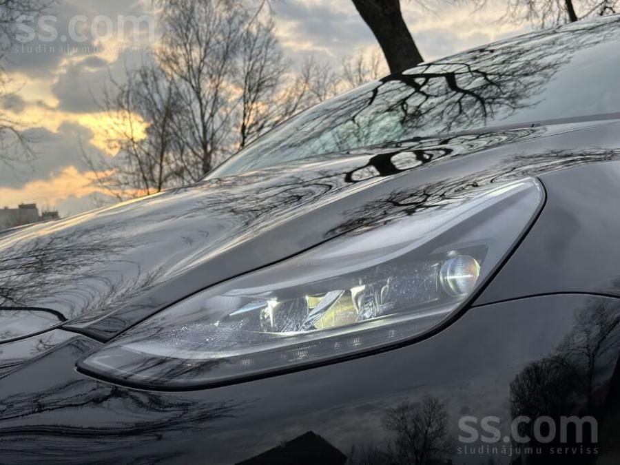 Black Tesla Model Y 2022 in Jelgava, with an engine capacity of 0.00 L and mileage of 63 thousand km for 31490 €, photo 8 on AUTOMOTO.COM.LV