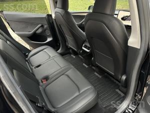 Black Tesla Model Y 2022 in Jelgava, with an engine capacity of 0.00 L and mileage of 63 thousand km for 31490 €, photo 12 on AUTOMOTO.COM.LV