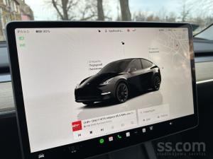 Black Tesla Model Y 2022 in Jelgava, with an engine capacity of 0.00 L and mileage of 63 thousand km for 31490 €, photo 15 on AUTOMOTO.COM.LV