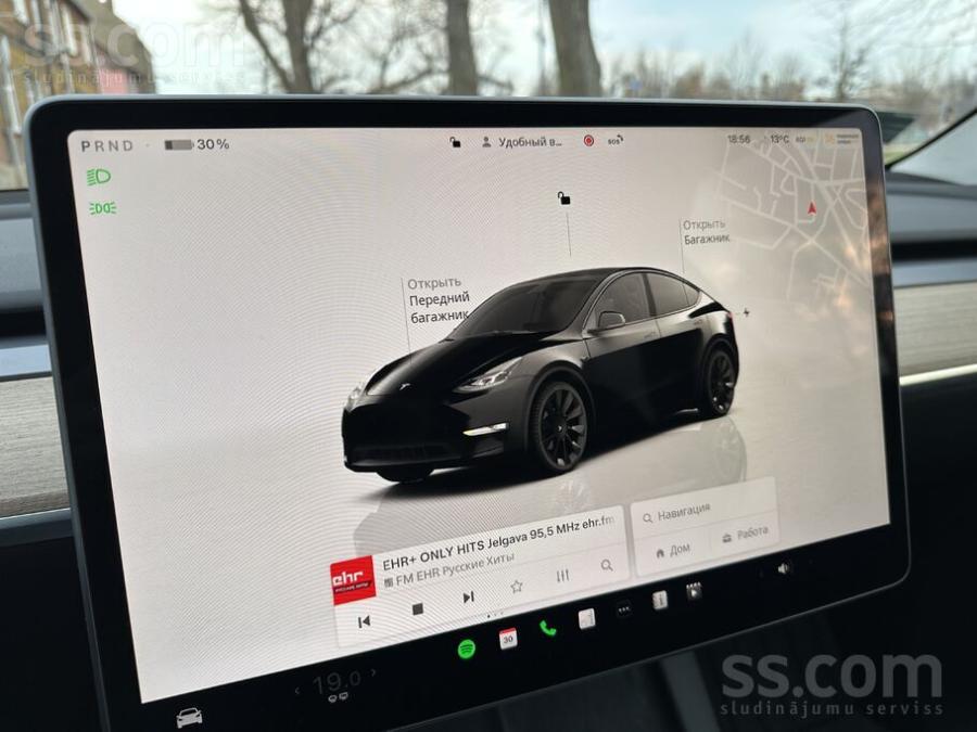 Black Tesla Model Y 2022 in Jelgava, with an engine capacity of 0.00 L and mileage of 63 thousand km for 31490 €, photo 15 on AUTOMOTO.COM.LV