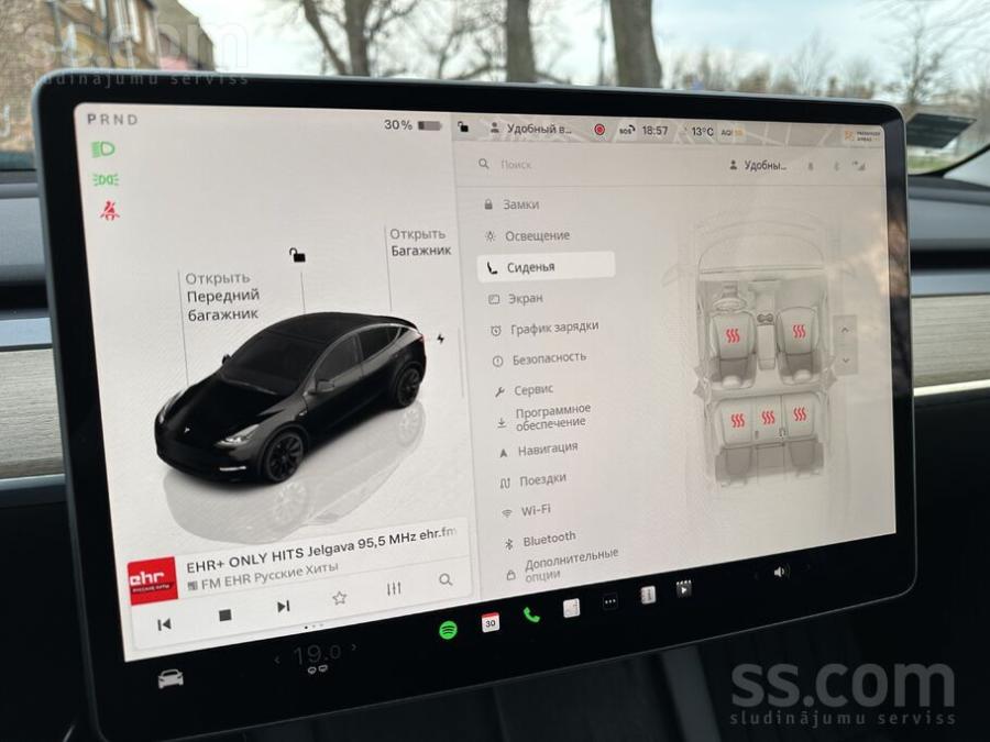Black Tesla Model Y 2022 in Jelgava, with an engine capacity of 0.00 L and mileage of 63 thousand km for 31490 €, photo 18 on AUTOMOTO.COM.LV