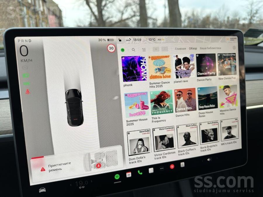 Black Tesla Model Y 2022 in Jelgava, with an engine capacity of 0.00 L and mileage of 63 thousand km for 31490 €, photo 19 on AUTOMOTO.COM.LV