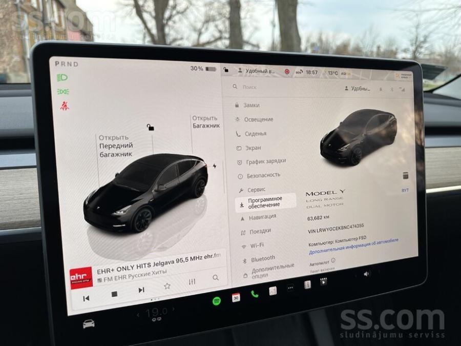 Black Tesla Model Y 2022 in Jelgava, with an engine capacity of 0.00 L and mileage of 63 thousand km for 31490 €, photo 22 on AUTOMOTO.COM.LV