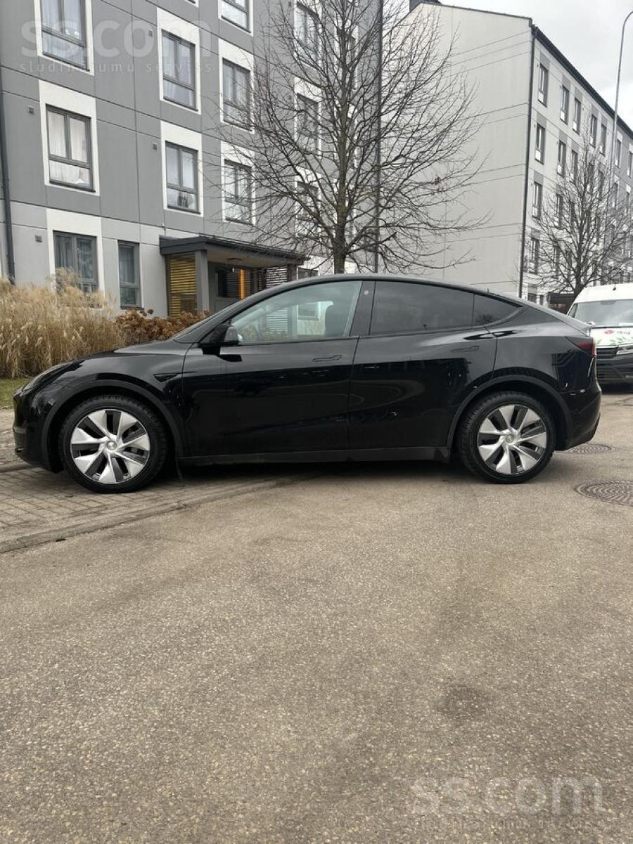 Black Tesla Model Y 2022 in Riga, with an engine capacity of 0.00 L and mileage of 108 thousand km for 31000 €, photo 8 on AUTOMOTO.COM.LV