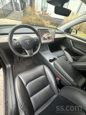 Black Tesla Model Y 2022 in Riga, with an engine capacity of 0.00 L and mileage of 108 thousand km for 31000 €, photo 13 on AUTOMOTO.COM.LV