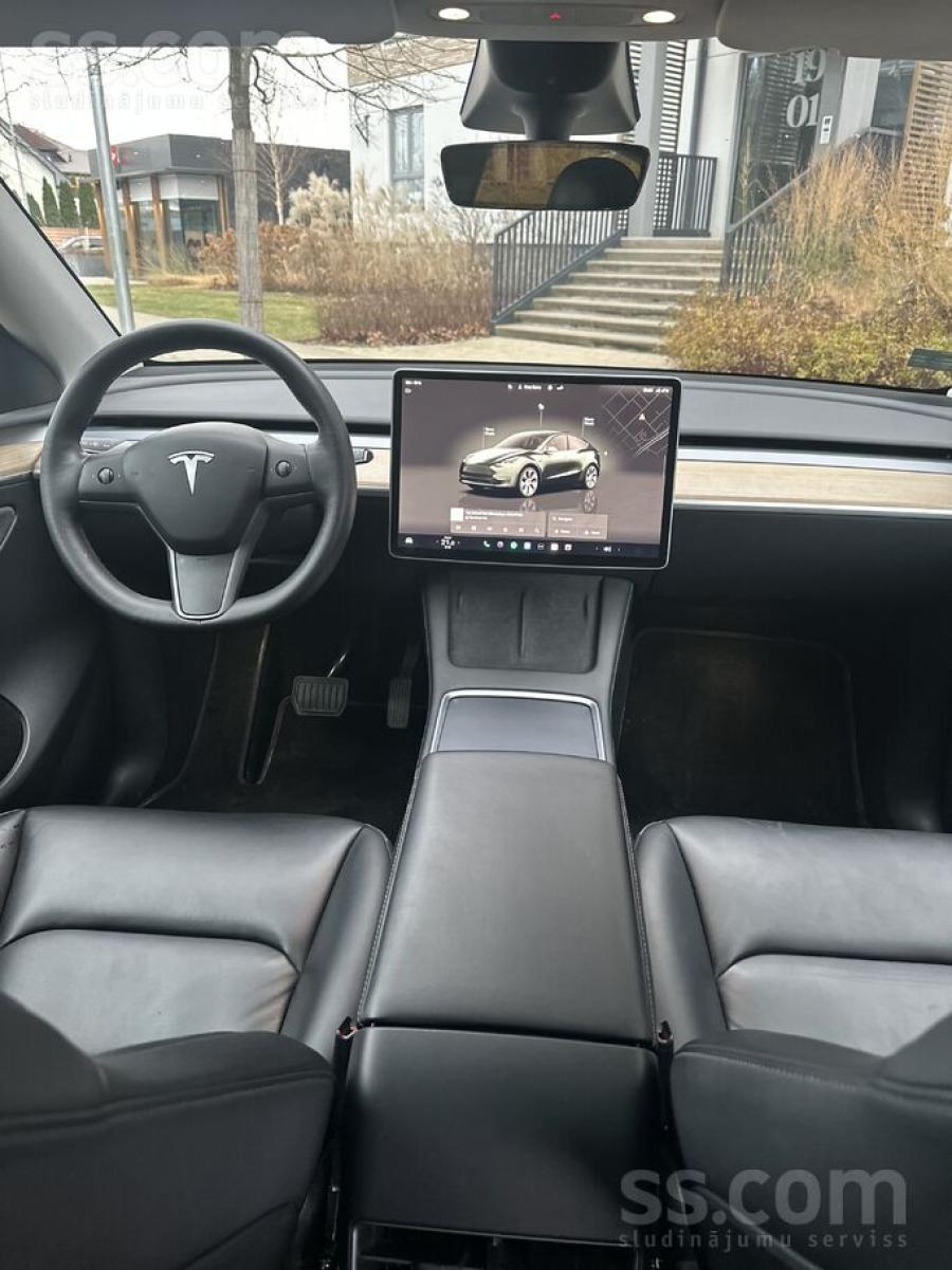 Black Tesla Model Y 2022 in Riga, with an engine capacity of 0.00 L and mileage of 108 thousand km for 31000 €, photo 16 on AUTOMOTO.COM.LV