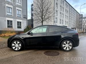 Black Tesla Model Y 2022 in Riga, with an engine capacity of 0.00 L and mileage of 100 thousand km for 31000 €, photo 8 on AUTOMOTO.COM.LV