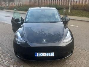 Black Tesla Model Y 2022 in Riga, with an engine capacity of 0.00 L and mileage of 100 thousand km for 31000 €, photo 10 on AUTOMOTO.COM.LV