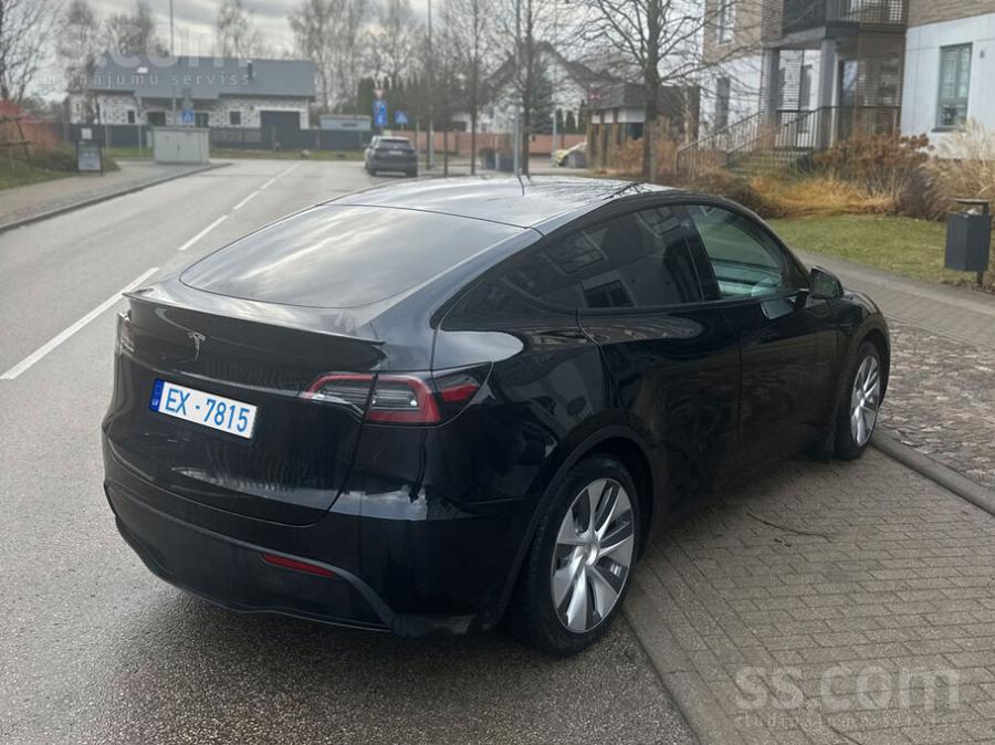 Black Tesla Model Y 2022 in Riga, with an engine capacity of 0.00 L and mileage of 100 thousand km for 31000 €, photo 14 on AUTOMOTO.COM.LV