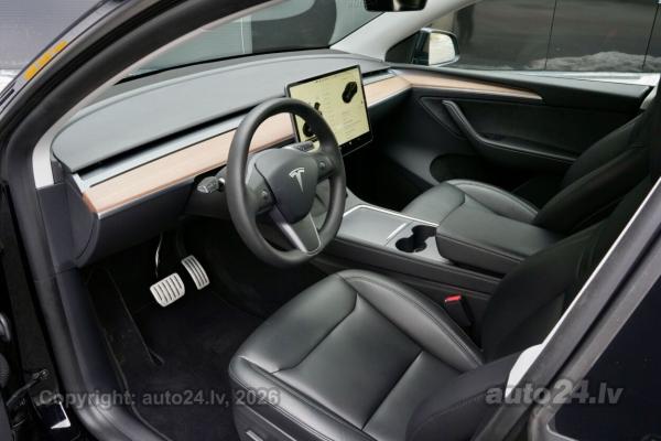 Black Tesla Model Y 2022 in Tallinn, with an engine capacity of 0.00 L and mileage of 78 thousand km for 36990 €, photo 3 on AUTOMOTO.COM.LV
