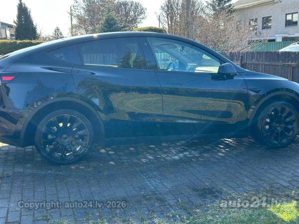 Black Tesla Model Y 2022 in Saue, with an engine capacity of 0.00 L and mileage of 75 thousand km for 36900 €, photo 3 on AUTOMOTO.COM.LV