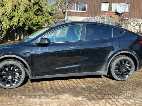 Black Tesla Model Y 2022 in Saue, with an engine capacity of 0.00 L and mileage of 75 thousand km for 36900 €, photo 6 on AUTOMOTO.COM.LV