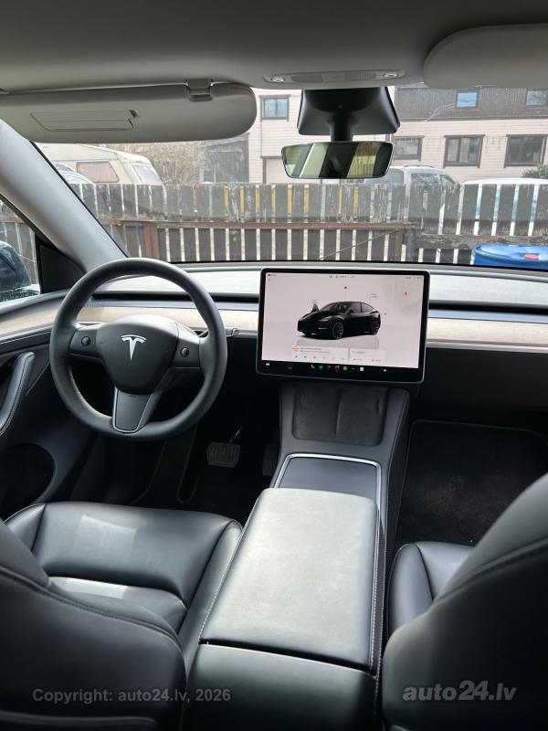 Black Tesla Model Y 2022 in Saue, with an engine capacity of 0.00 L and mileage of 75 thousand km for 36900 €, photo 8 on AUTOMOTO.COM.LV