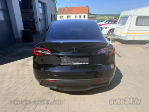 Black Tesla Model Y 2022 in Tallinn, with an engine capacity of 0.00 L and mileage of 93 thousand km for 34990 €, photo 3 on AUTOMOTO.COM.LV