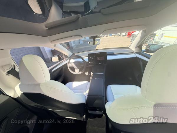 Black Tesla Model Y 2022 in Tallinn, with an engine capacity of 0.00 L and mileage of 93 thousand km for 34990 €, photo 5 on AUTOMOTO.COM.LV