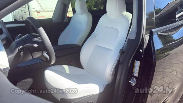 Black Tesla Model Y 2022 in Tallinn, with an engine capacity of 0.00 L and mileage of 93 thousand km for 34990 €, photo 6 on AUTOMOTO.COM.LV