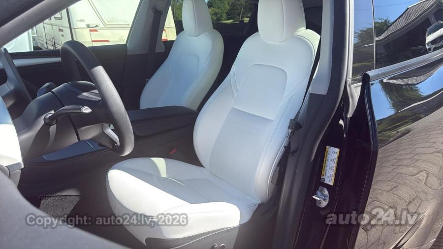 Black Tesla Model Y 2022 in Tallinn, with an engine capacity of 0.00 L and mileage of 93 thousand km for 34990 €, photo 7 on AUTOMOTO.COM.LV