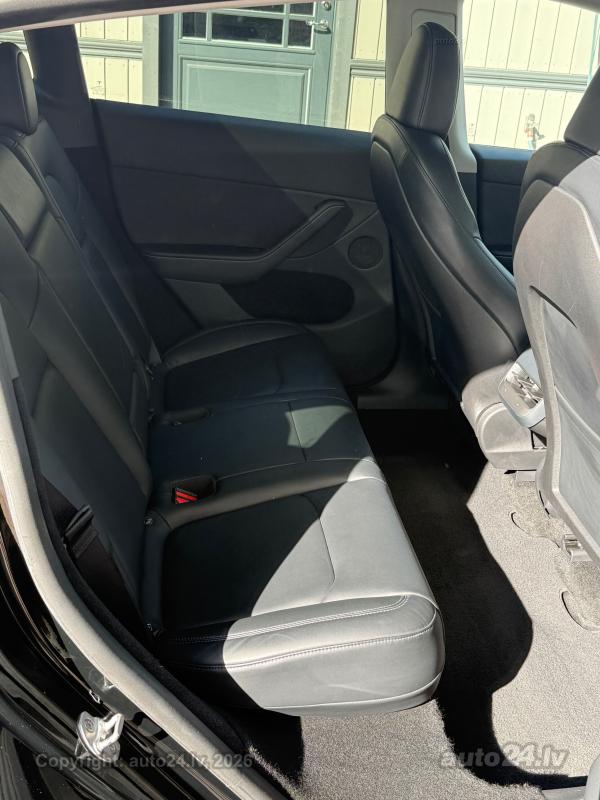 Black Tesla Model Y 2022 in Tallinn, with an engine capacity of 0.00 L and mileage of 68 thousand km for 38500 €, photo 9 on AUTOMOTO.COM.LV