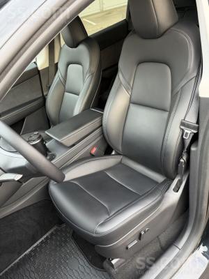 Black Tesla Model Y 2022 in Riga, with an engine capacity of 0.00 L and mileage of 70 thousand km for 34900 €, photo 13 on AUTOMOTO.COM.LV