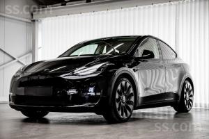 Black Tesla Model Y 2022 in Tukums, with an engine capacity of 0.00 L and mileage of 84 thousand km for 37990 €, photo  on AUTOMOTO.COM.LV