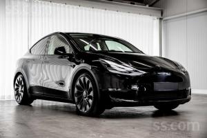 Black Tesla Model Y 2022 in Tukums, with an engine capacity of 0.00 L and mileage of 84 thousand km for 37990 €, photo 3 on AUTOMOTO.COM.LV