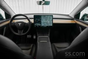 Black Tesla Model Y 2022 in Tukums, with an engine capacity of 0.00 L and mileage of 84 thousand km for 37990 €, photo 6 on AUTOMOTO.COM.LV