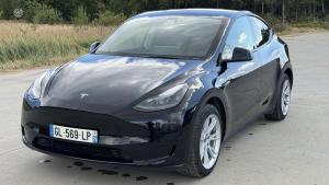 Black Tesla Model Y 2022 in Jonava, with an engine capacity of 0.00 L and mileage of 128 thousand km for 22650 €, photo  on AUTOMOTO.COM.LV