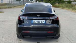Black Tesla Model Y 2022 in Jonava, with an engine capacity of 0.00 L and mileage of 128 thousand km for 22650 €, photo 7 on AUTOMOTO.COM.LV