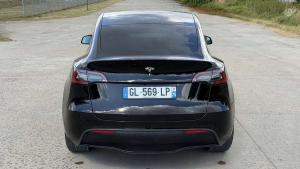 Black Tesla Model Y 2022 in Jonava, with an engine capacity of 0.00 L and mileage of 128 thousand km for 22650 €, photo 15 on AUTOMOTO.COM.LV