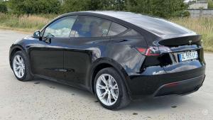 Black Tesla Model Y 2022 in Jonava, with an engine capacity of 0.00 L and mileage of 128 thousand km for 22650 €, photo 16 on AUTOMOTO.COM.LV