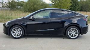 Black Tesla Model Y 2022 in Jonava, with an engine capacity of 0.00 L and mileage of 128 thousand km for 22650 €, photo 17 on AUTOMOTO.COM.LV