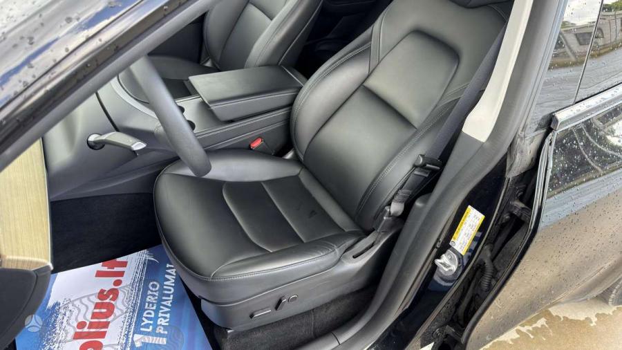Black Tesla Model Y 2022 in Jonava, with an engine capacity of 0.00 L and mileage of 128 thousand km for 22650 €, photo 18 on AUTOMOTO.COM.LV