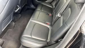 Black Tesla Model Y 2022 in Jonava, with an engine capacity of 0.00 L and mileage of 128 thousand km for 22650 €, photo 21 on AUTOMOTO.COM.LV