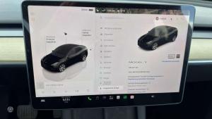 Black Tesla Model Y 2022 in Jonava, with an engine capacity of 0.00 L and mileage of 128 thousand km for 22650 €, photo 23 on AUTOMOTO.COM.LV
