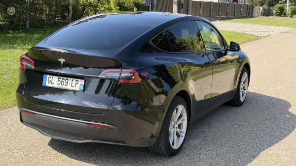 Black Tesla Model Y 2022 in Jonava, with an engine capacity of 0.00 L and mileage of 128 thousand km for 21800 €, photo 5 on AUTOMOTO.COM.LV