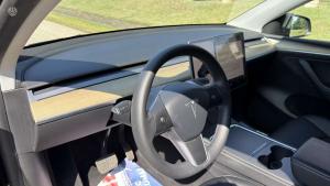 Melns Tesla Model Y 2022 Jonava, ar dzinēja tilpumu 0.00 L un nobraukumu 128 tūkst. km par 21400 €, foto 22 vietnē AUTOMOTO.COM.LV