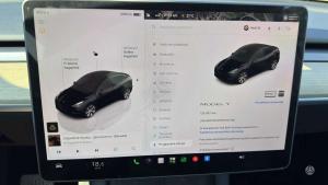 Black Tesla Model Y 2022 in Jonava, with an engine capacity of 0.00 L and mileage of 128 thousand km for 21000 €, photo 23 on AUTOMOTO.COM.LV