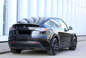 Black Tesla Model Y 2022 in Vilnius, with an engine capacity of 0.00 L and mileage of 80 thousand km for 31000 €, photo 6 on AUTOMOTO.COM.LV