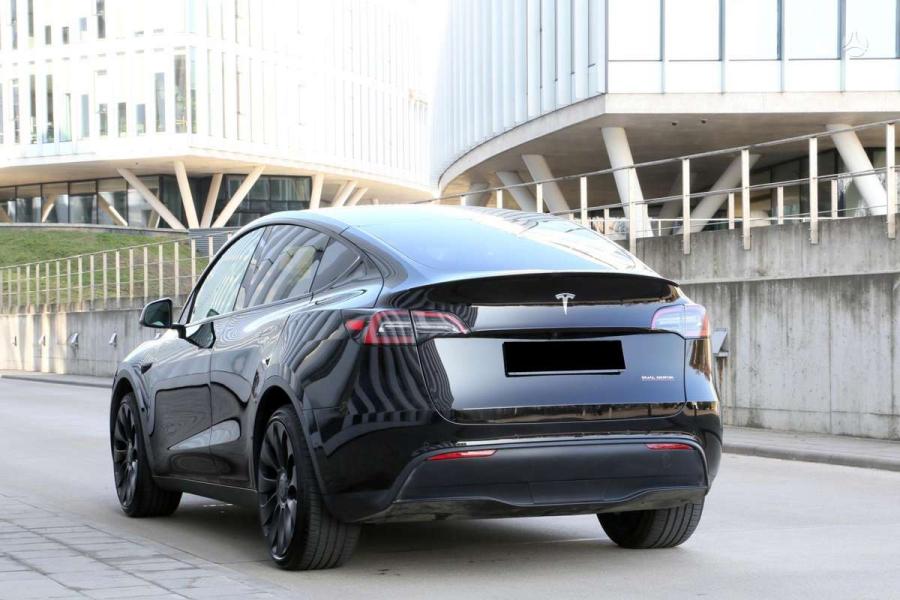 Black Tesla Model Y 2022 in Vilnius, with an engine capacity of 0.00 L and mileage of 80 thousand km for 31000 €, photo 7 on AUTOMOTO.COM.LV