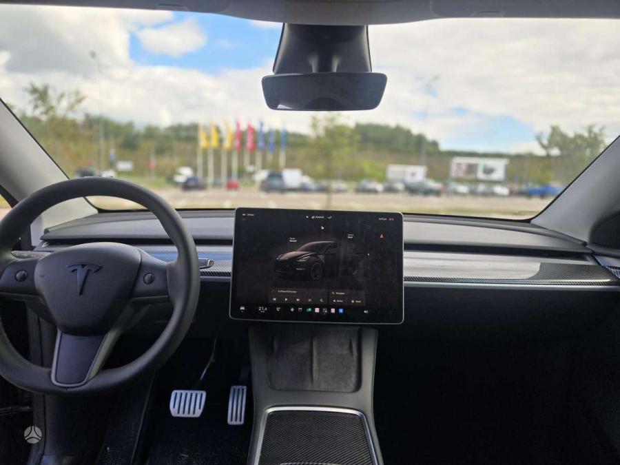 Black Tesla Model Y 2022 in Vilnius, with an engine capacity of 0.00 L and mileage of 80 thousand km for 31000 €, photo 11 on AUTOMOTO.COM.LV