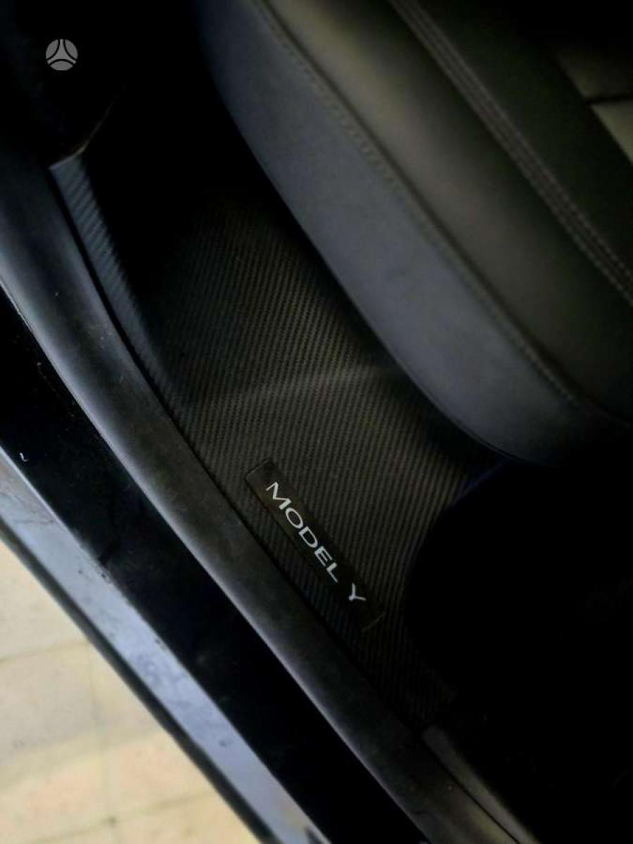 Black Tesla Model Y 2022 in Vilnius, with an engine capacity of 0.00 L and mileage of 80 thousand km for 31000 €, photo 13 on AUTOMOTO.COM.LV