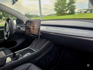 Black Tesla Model Y 2022 in Vilnius, with an engine capacity of 0.00 L and mileage of 80 thousand km for 31000 €, photo 14 on AUTOMOTO.COM.LV