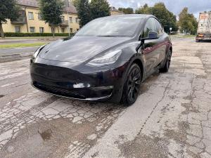 Black Tesla Model Y 2022 in Siauliai, with an engine capacity of 0.00 L and mileage of 58 thousand km for 28900 €, photo 11 on AUTOMOTO.COM.LV