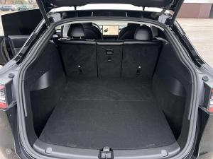 Black Tesla Model Y 2022 in Siauliai, with an engine capacity of 0.00 L and mileage of 58 thousand km for 28900 €, photo 14 on AUTOMOTO.COM.LV